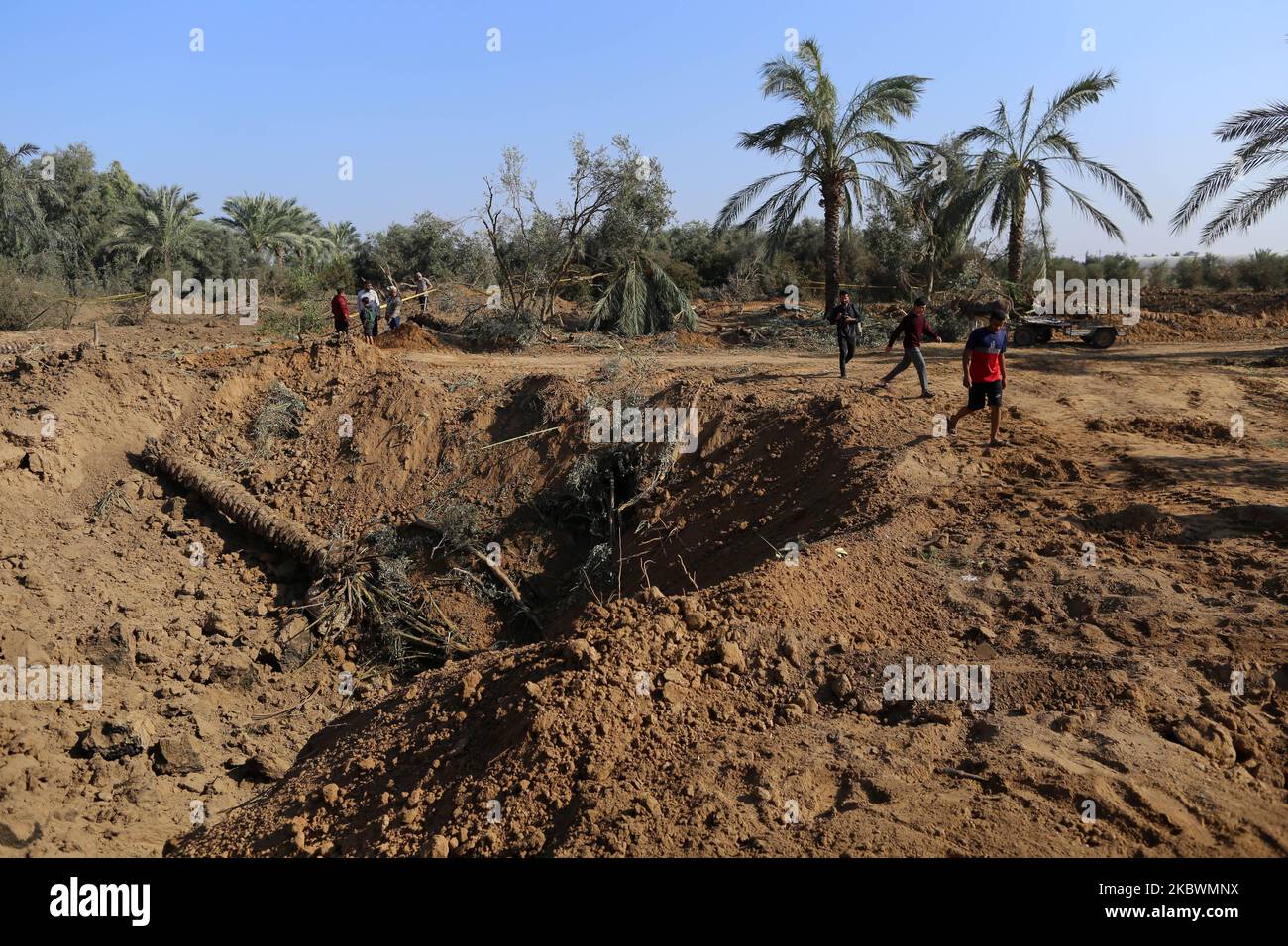 Gaza. 4th Nov, 2022. People check damage caused by an Israeli airstrike ...