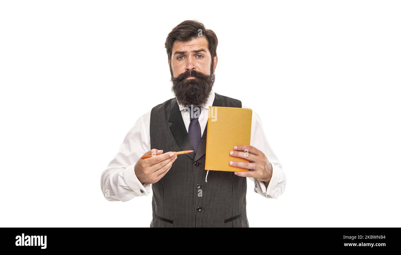 Serious bearded man point writing pen at school book isolated on white ...