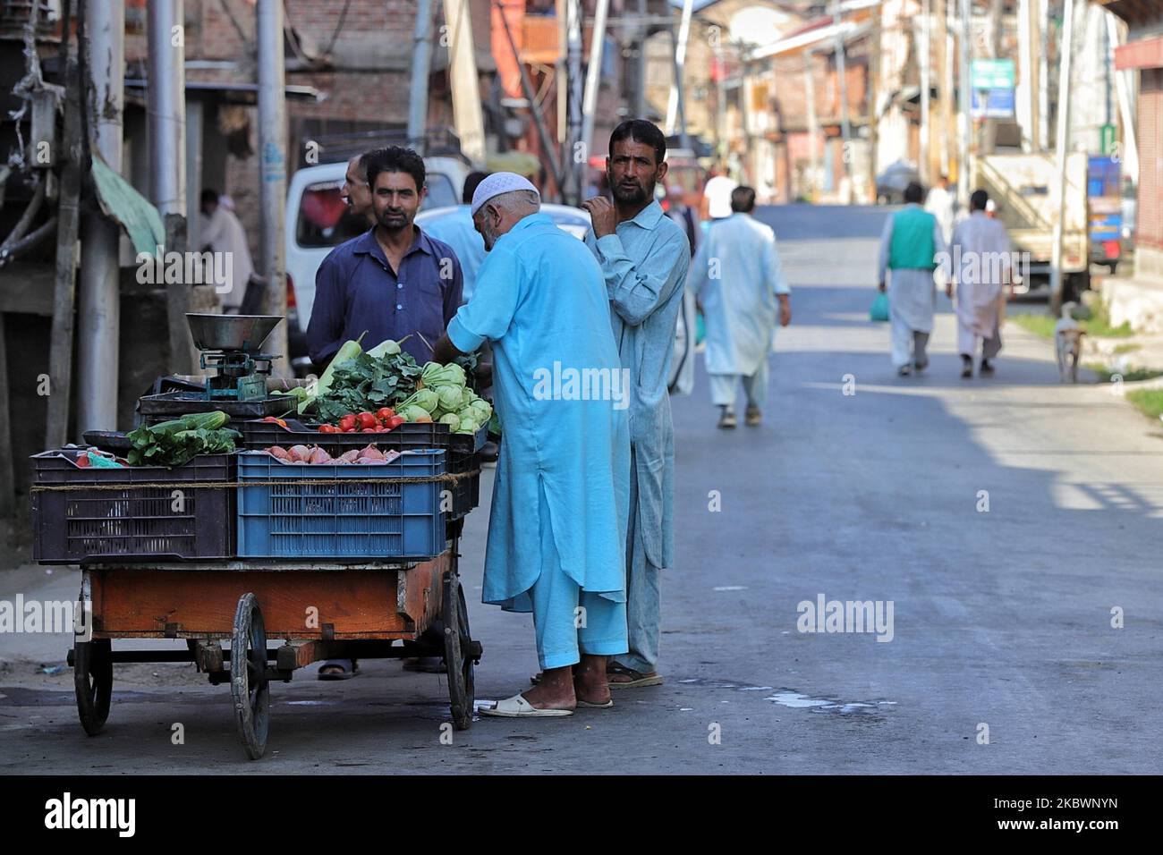 Kashmiri muslims purchase vegetables hi-res stock photography and ...