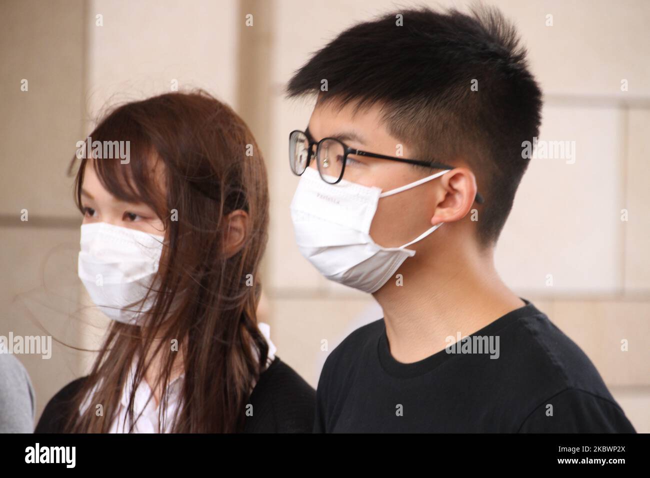Angus Chau and Joshua Wong is seen entering to attend a press ...