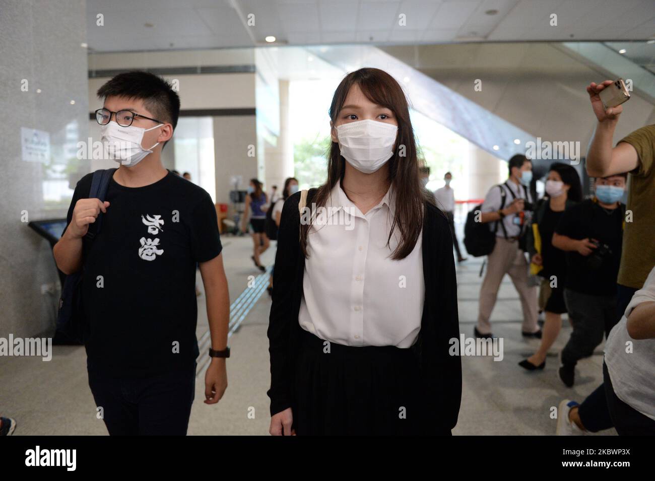 Angus Chau and Joshua Wong is seen entering to attend a press ...