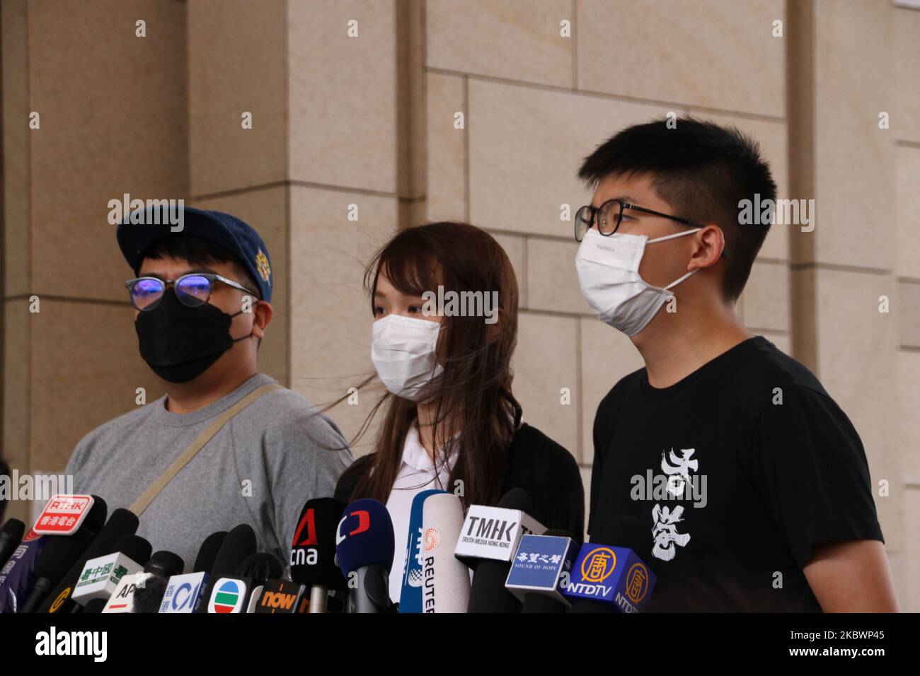 Angus Chau and Joshua Wong is seen entering to attend a press ...