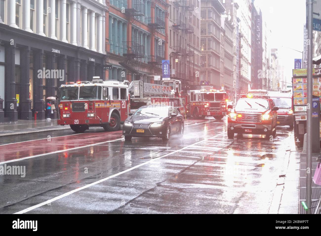FDNY is seen responding to loose debris hanging by a building as in ...