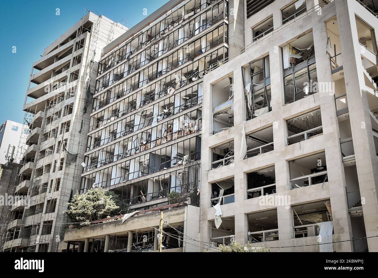 Damaged buildings are seen the day after a massive explosion at the ...