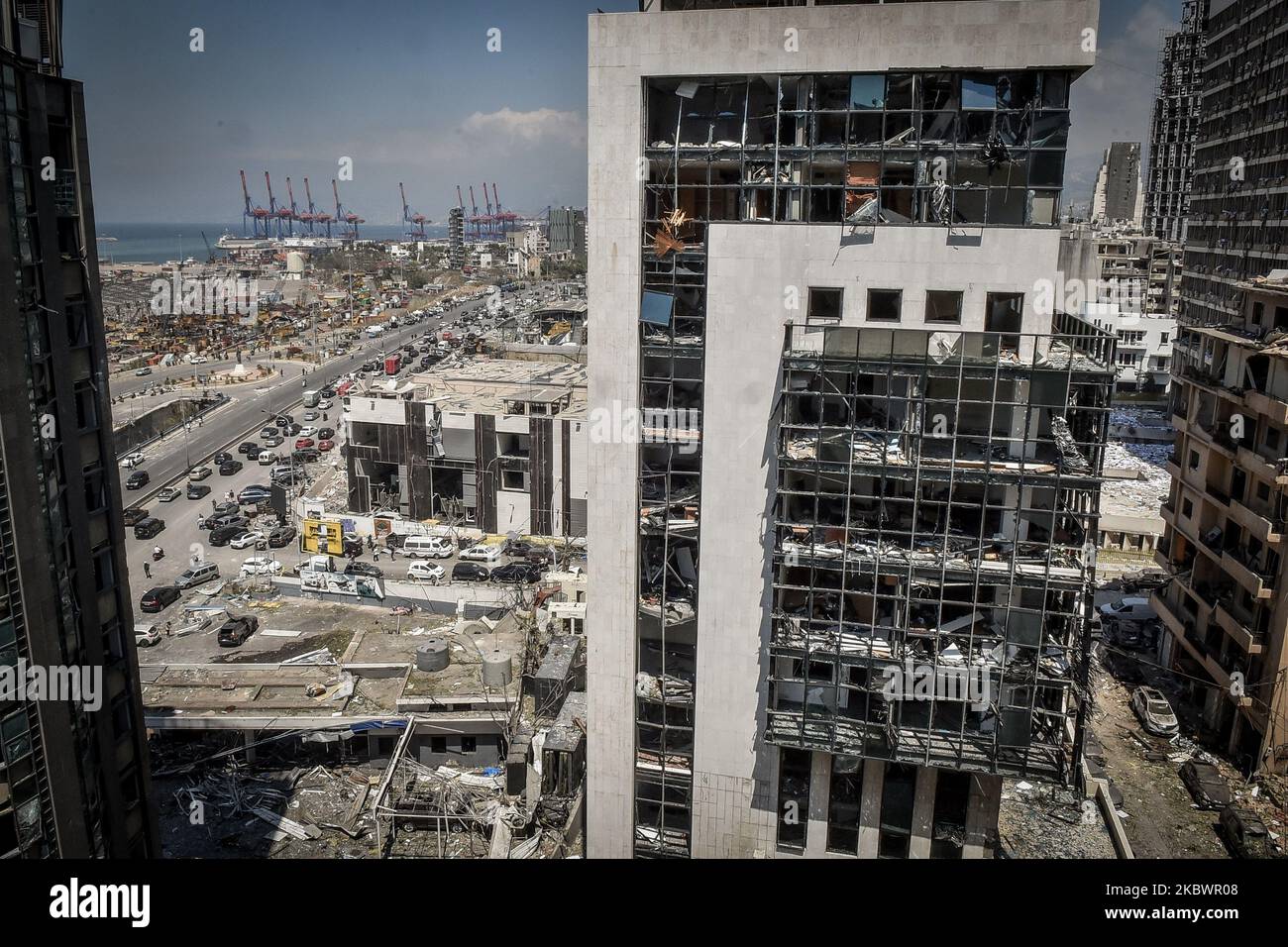 Damaged buildings are seen the day after a massive explosion at the ...