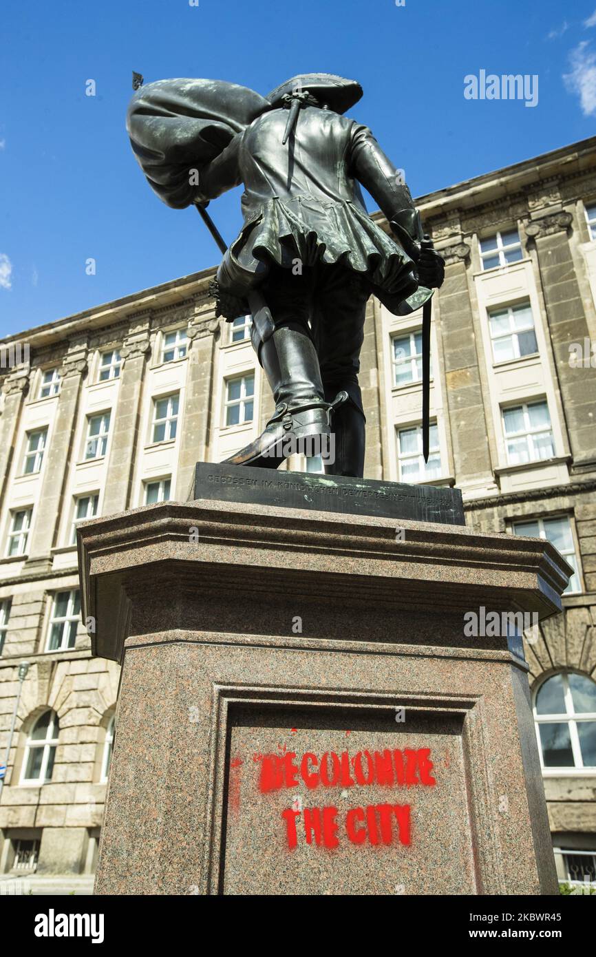 A graffitti reading 'Decolonize the city' is seen on the statue of Kurt ...