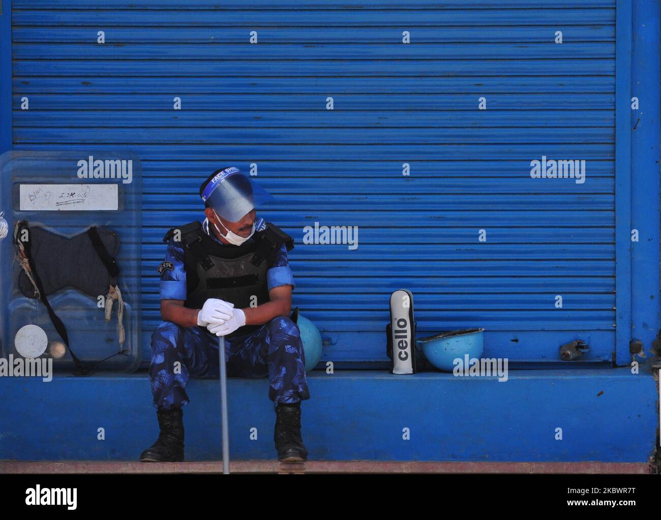 A Security personnel guards a street during Ground breaking ceremony ...
