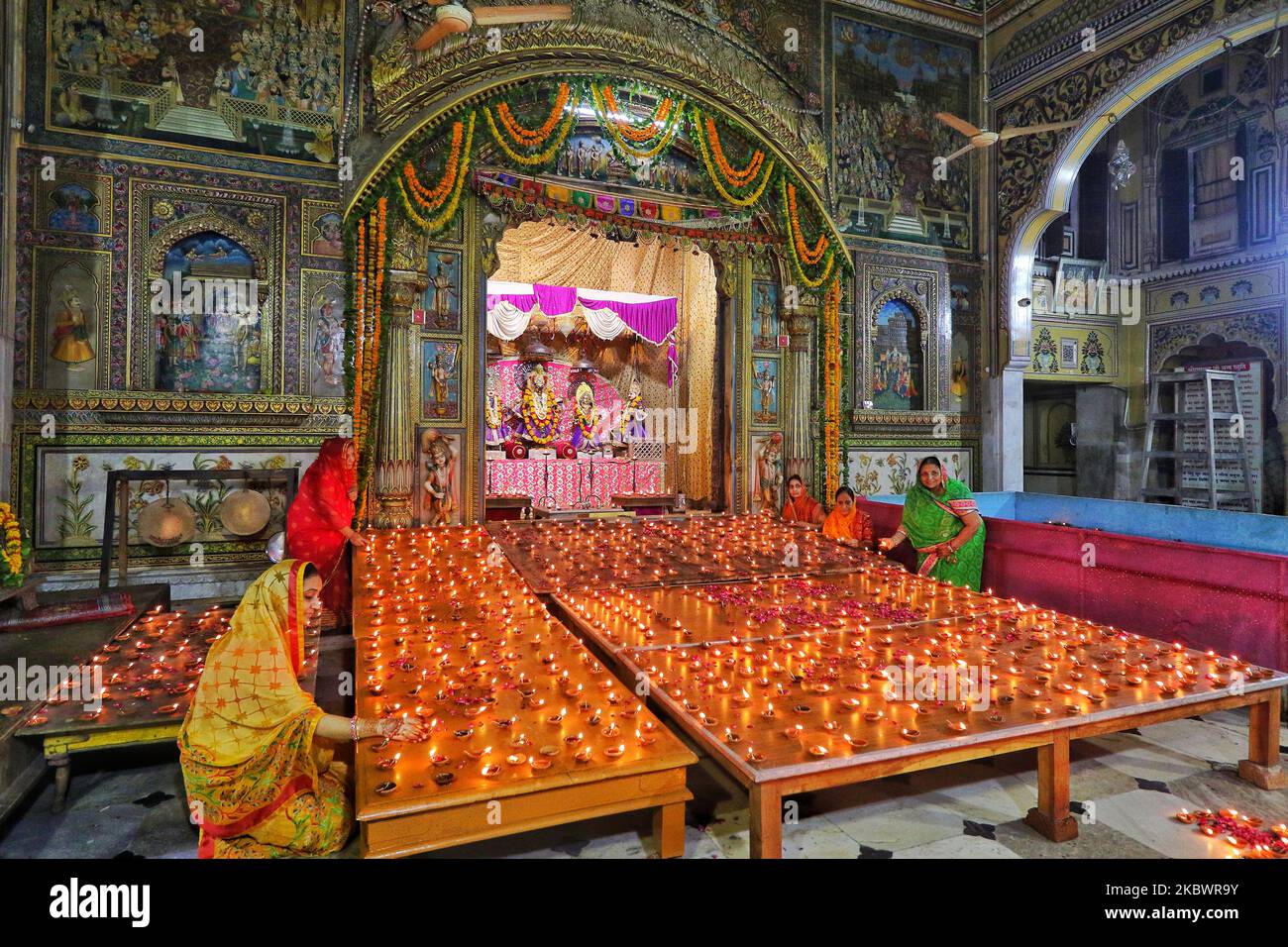 Hindu devotees light earthen lamps at Ramchandra Ji Temple to celebrate ...