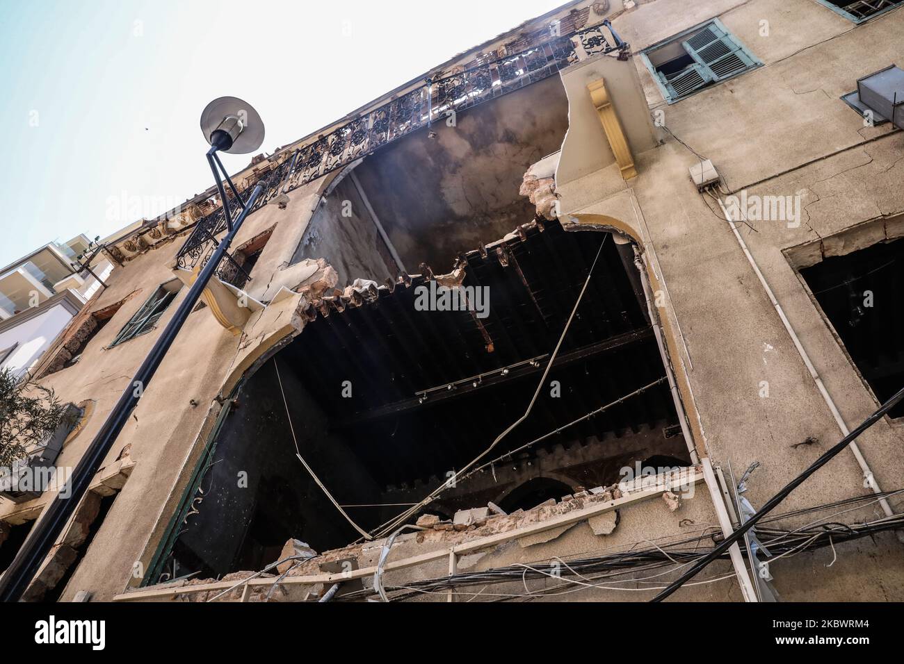 Damaged buildings are seen the day after a massive explosion at the ...