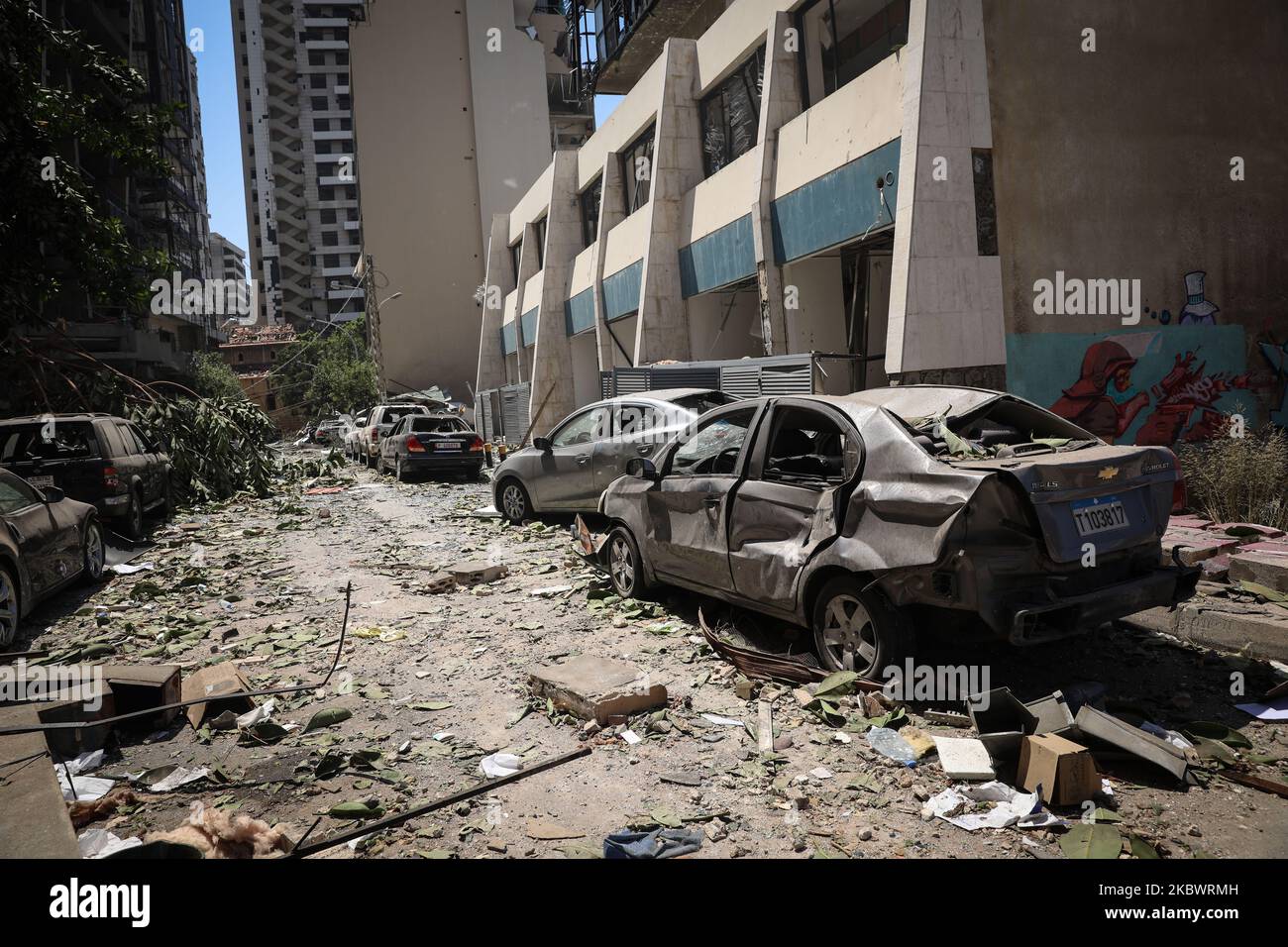 Damaged buildings are seen the day after a massive explosion at the ...