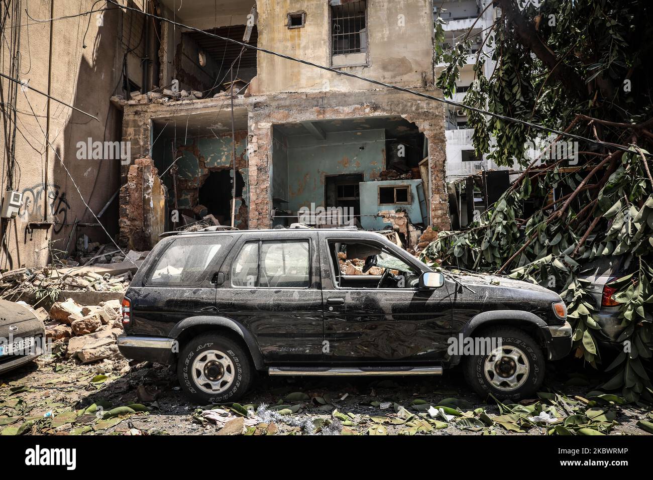 Damaged buildings are seen the day after a massive explosion at the ...