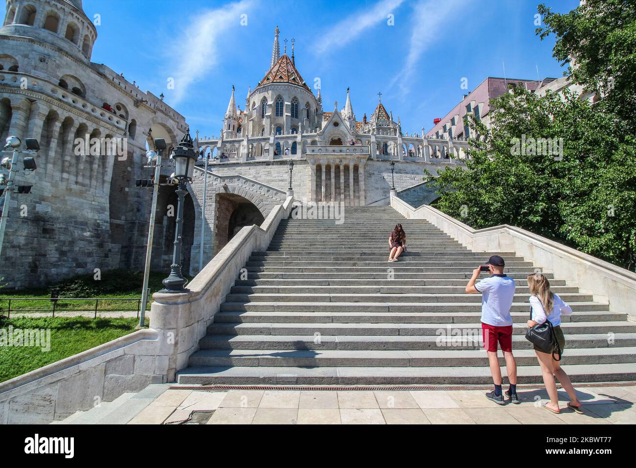 Young people taking a picture on the stairs while visiting Varkert ...