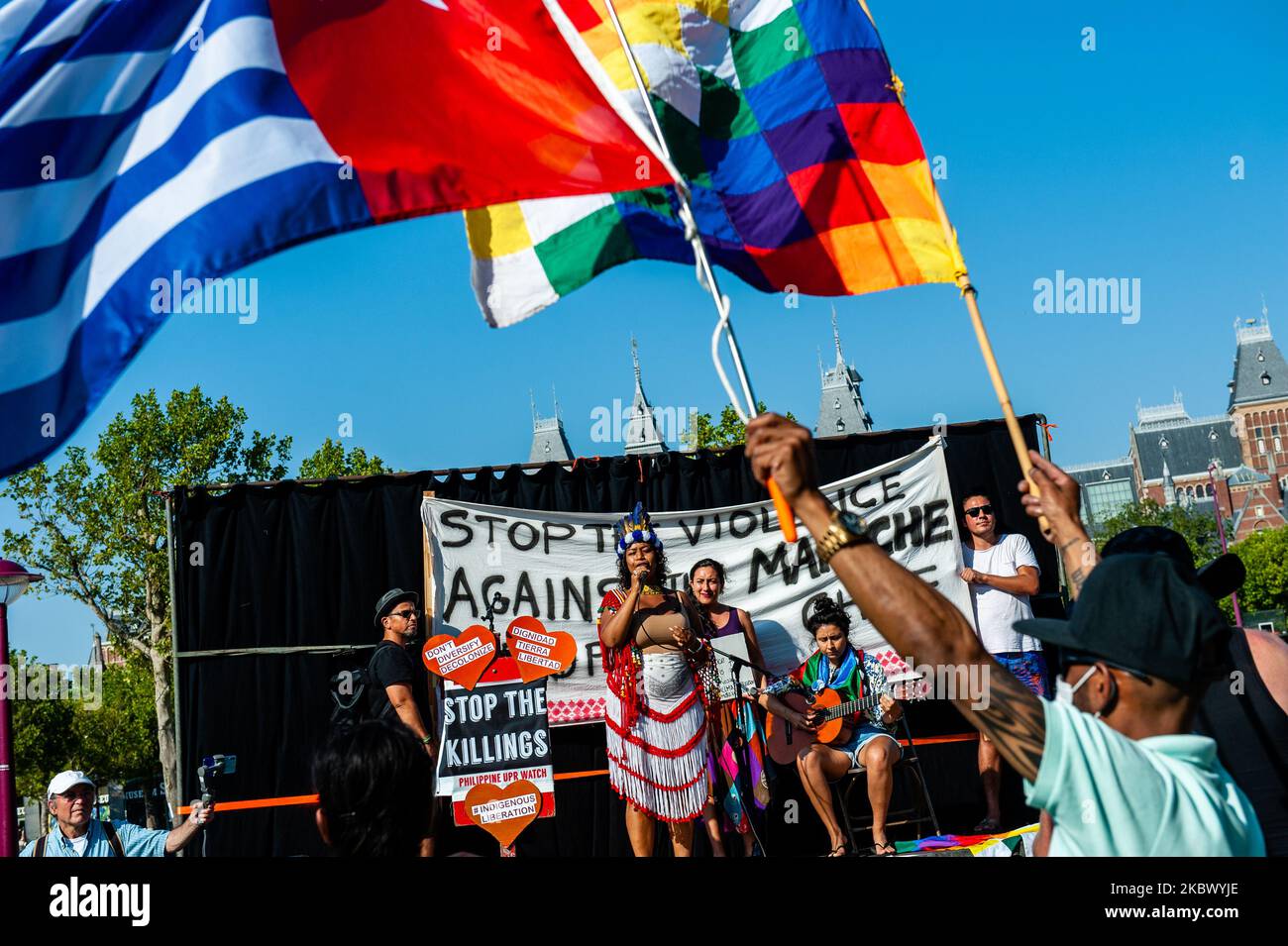A woman is giving a speech, during the Demonstration in defense of the ...