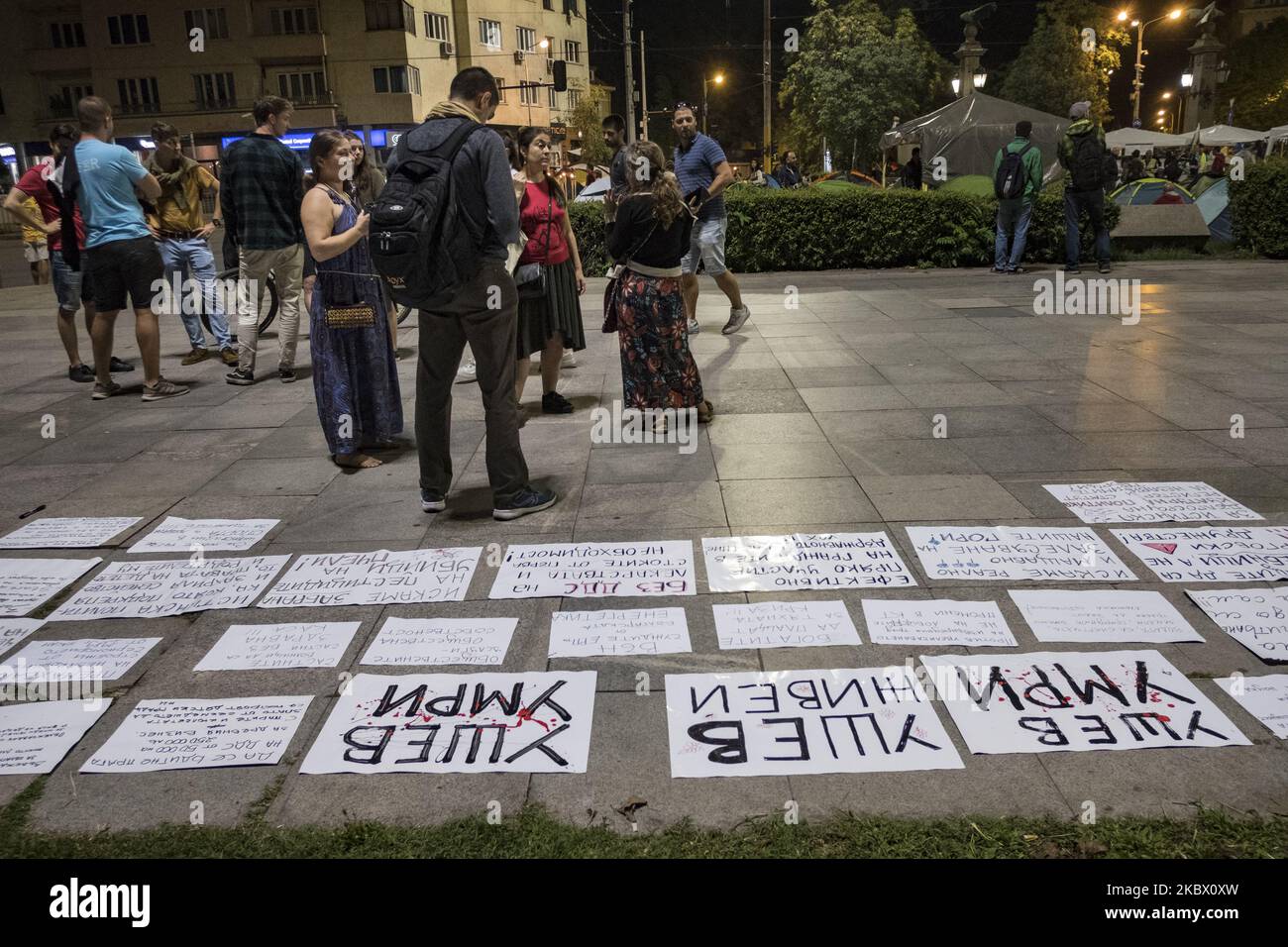 Handmade signs on display as protesters gathered for a 31st night ...