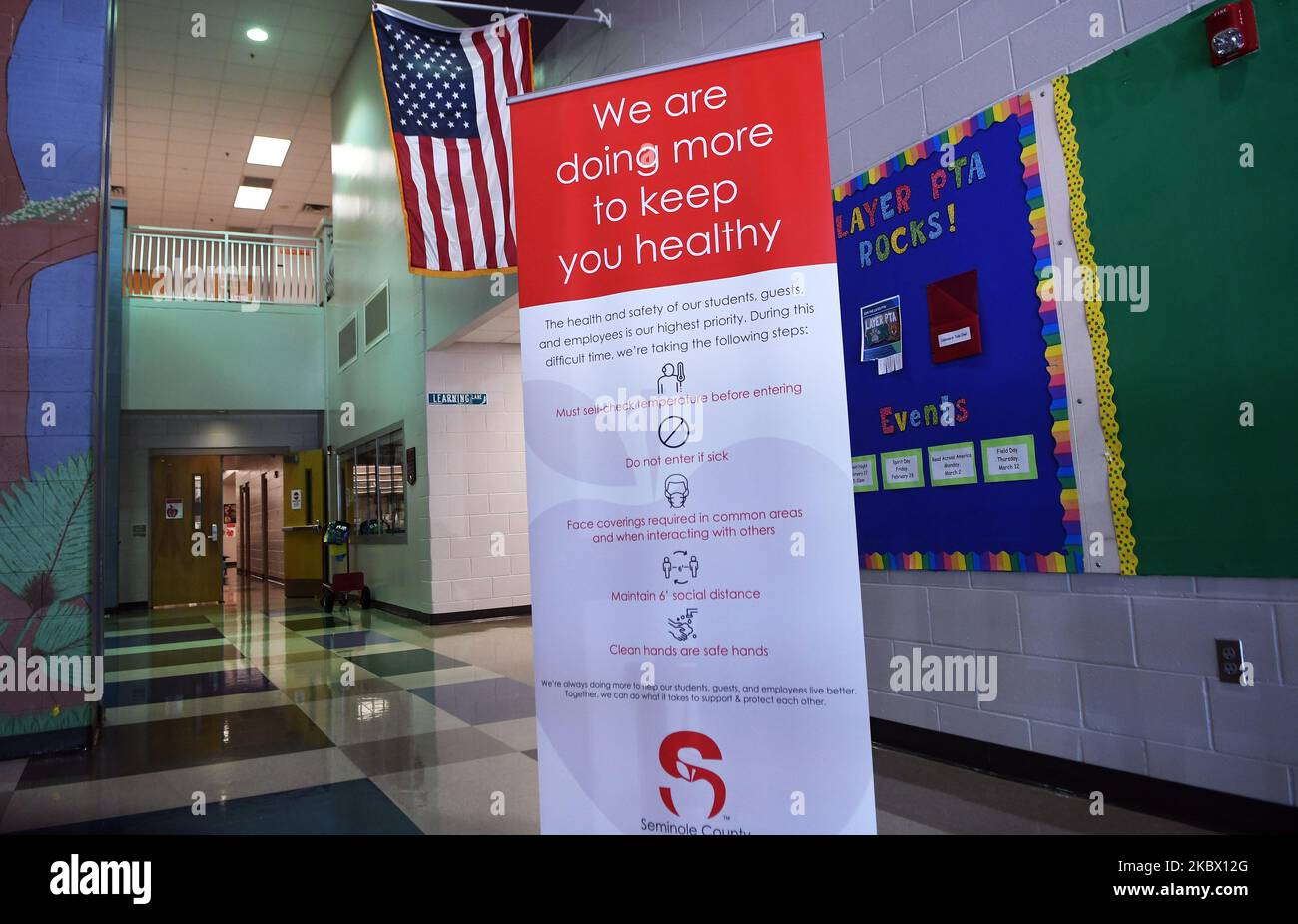 Heath safety precautions are seen posted in the lobby at Layer ...