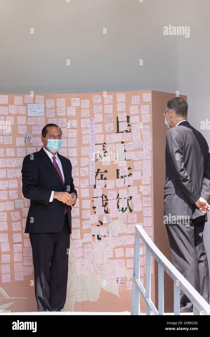 U.S Health Secretary, Alex Azar posing beside the message of ...