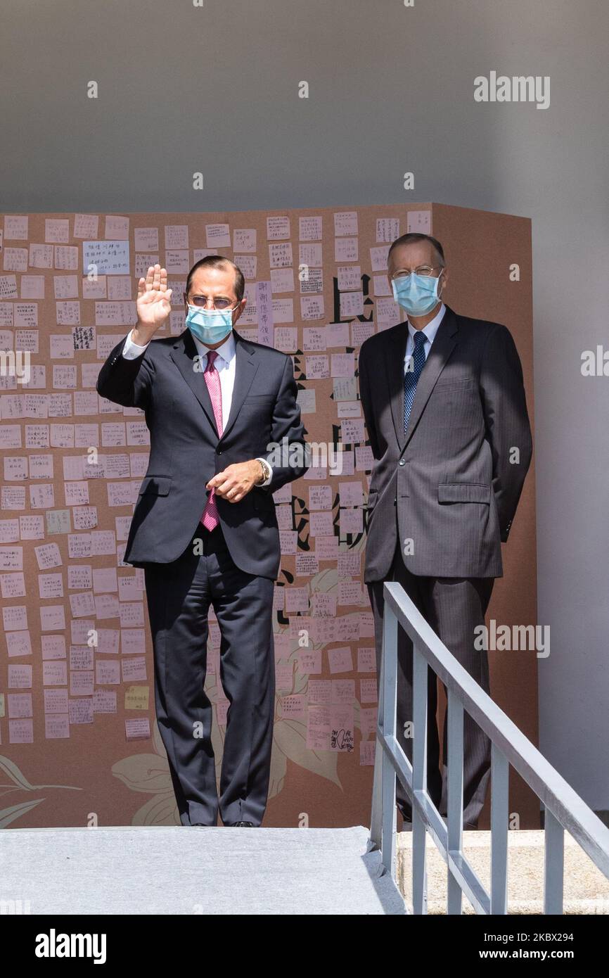 U.S Health Secretary, Alex Azar posing beside the message of ...