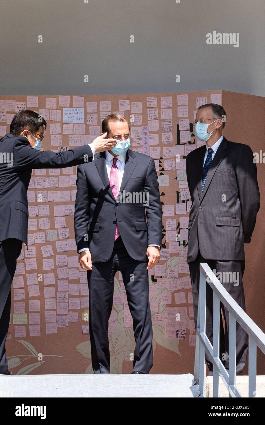 U.S Health Secretary, Alex Azar posing beside the message of ...