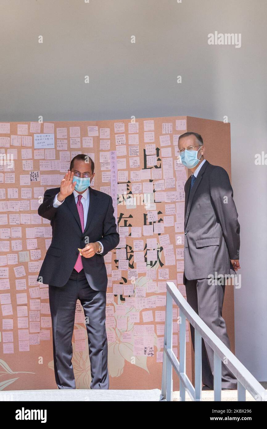 U.S Health Secretary, Alex Azar posing beside the message of ...