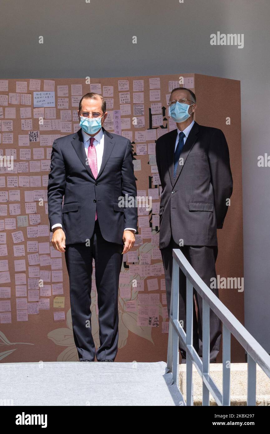 U.S Health Secretary, Alex Azar posing beside the message of ...