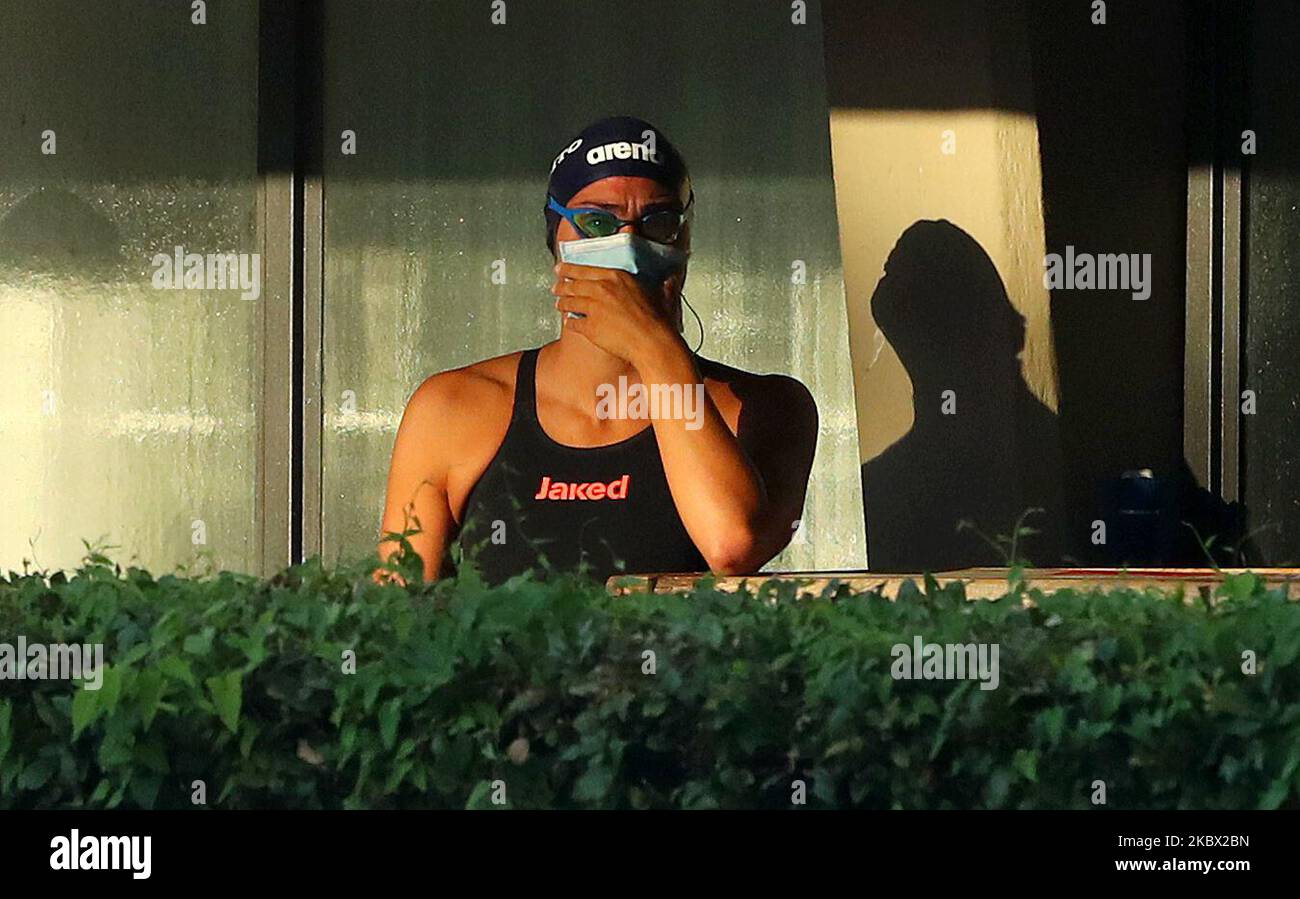 A swimmer wears a face mask during the international swimming trophy ...