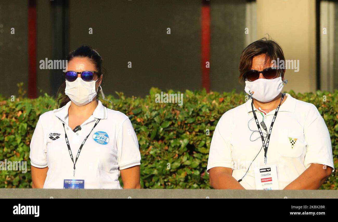 Judges wear face masks during the international swimming trophy ...