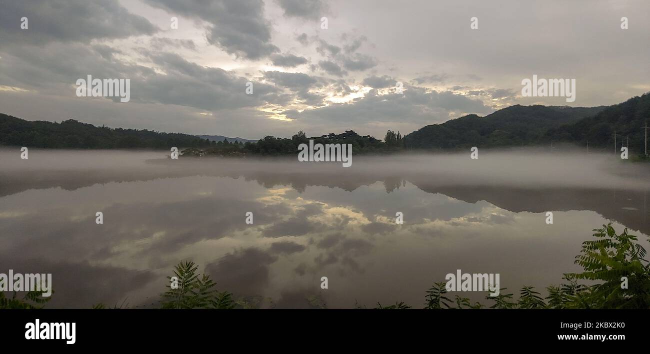 A View scene as sunset after heavy rain at lake near Andong-Dam in ...