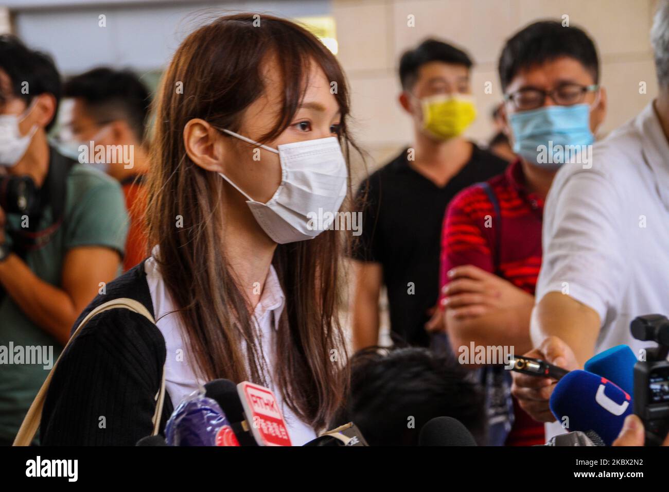 Agnes Chow addresses the press after a hearing at West Kowloon ...