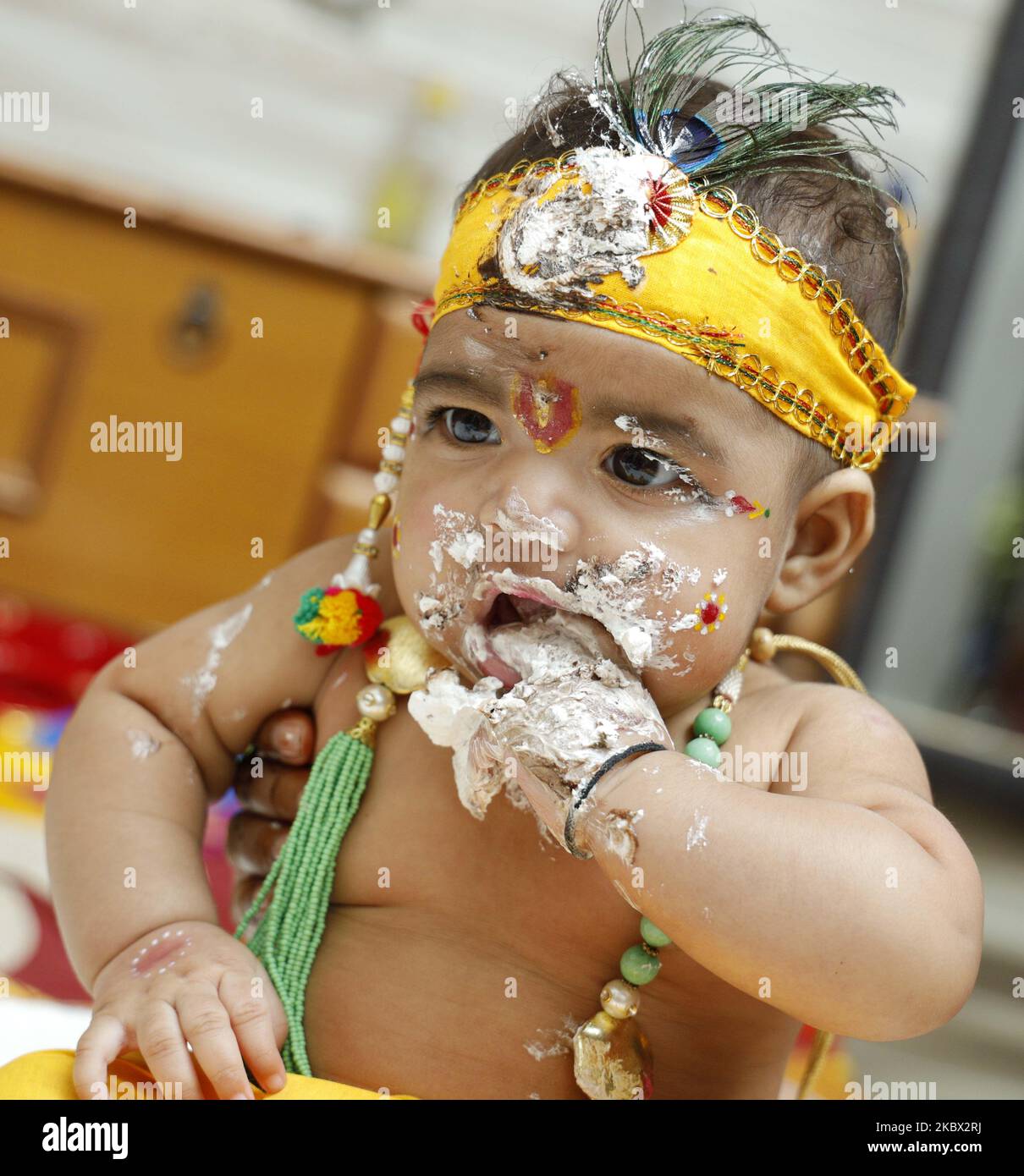 Child Dressed As Hindu Lord Krishna, During The Celebrations Of ...