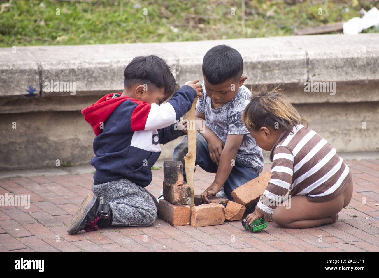 Indigenous Embera children playing in the makeshift camp in a park in ...
