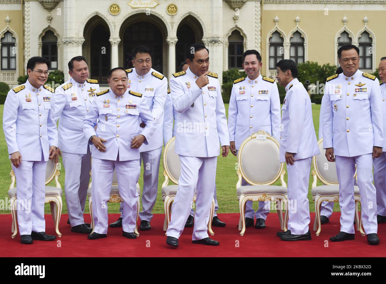 Thai Prime Minister Prayut Chan-o-cha (C) during a group photo after cabinet reshuffle at ...