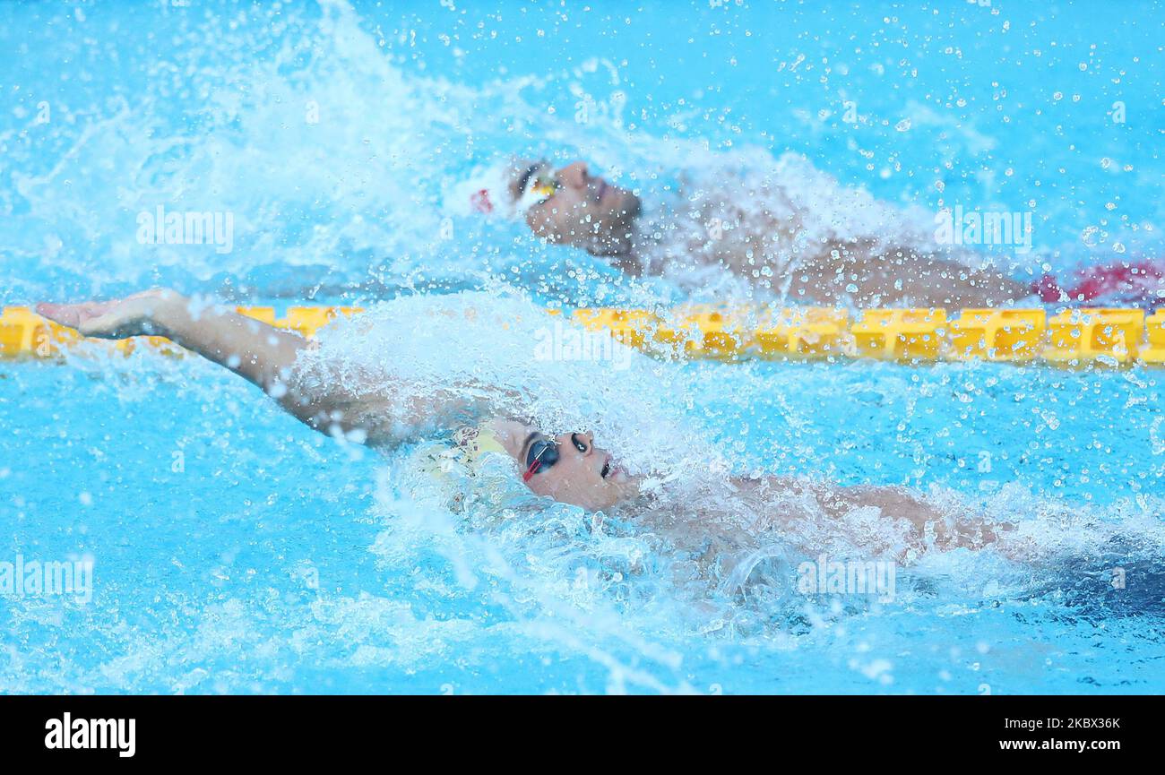 Luca Mencarini (ITA) competes in men's 100m backstroke during the ...
