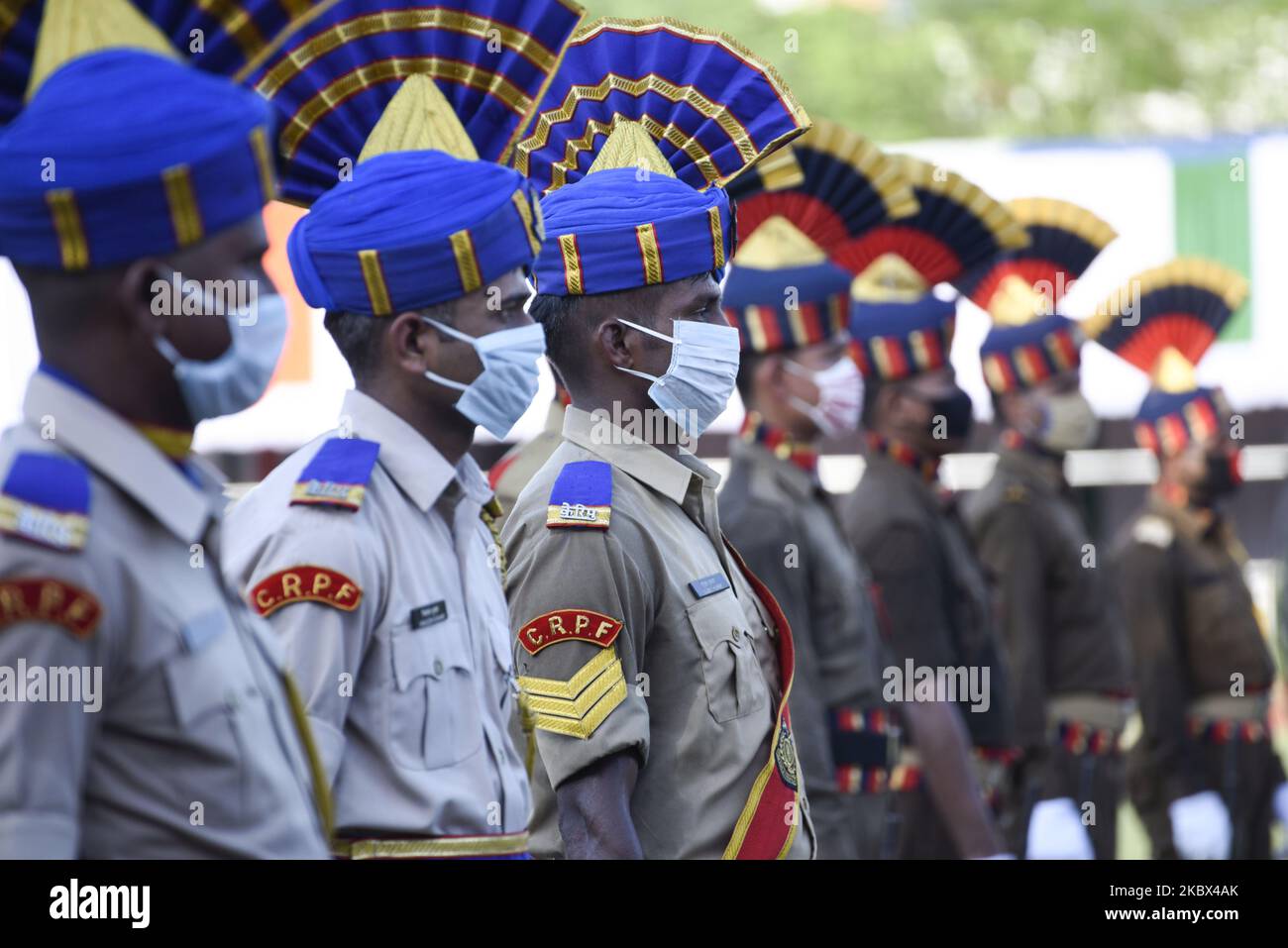 Indian paramilitary soldiers wearing mask during the full dress ...