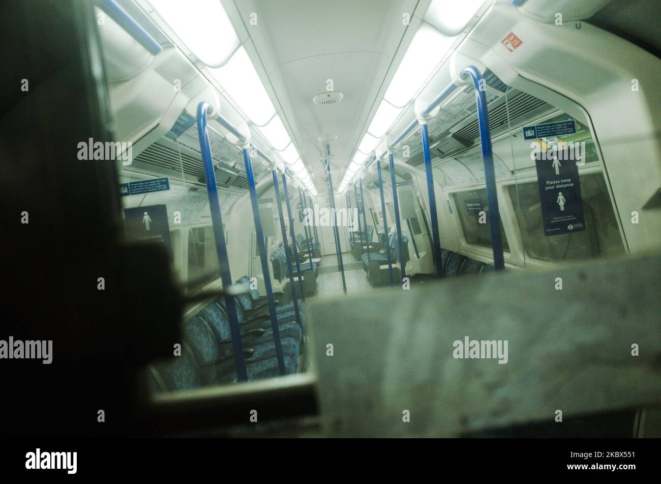 An empty tube carriage rides along the Northern line in London, England ...