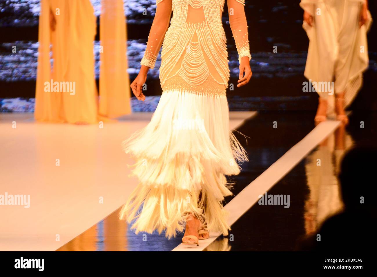 A models display creations by designer Dimuthu sahabandu during Colombo ...