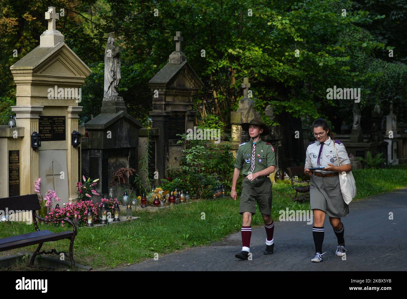 A couple of local scouts arriving ahead of the ceremony. Hundreds of ...
