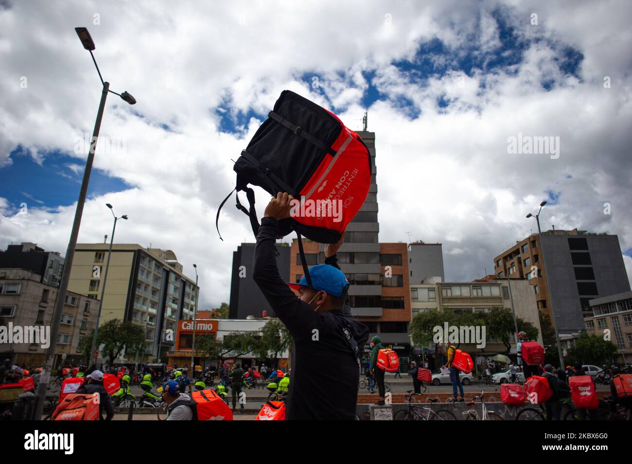 Delivery couriers from the takeout and shopping app service Rappi ...