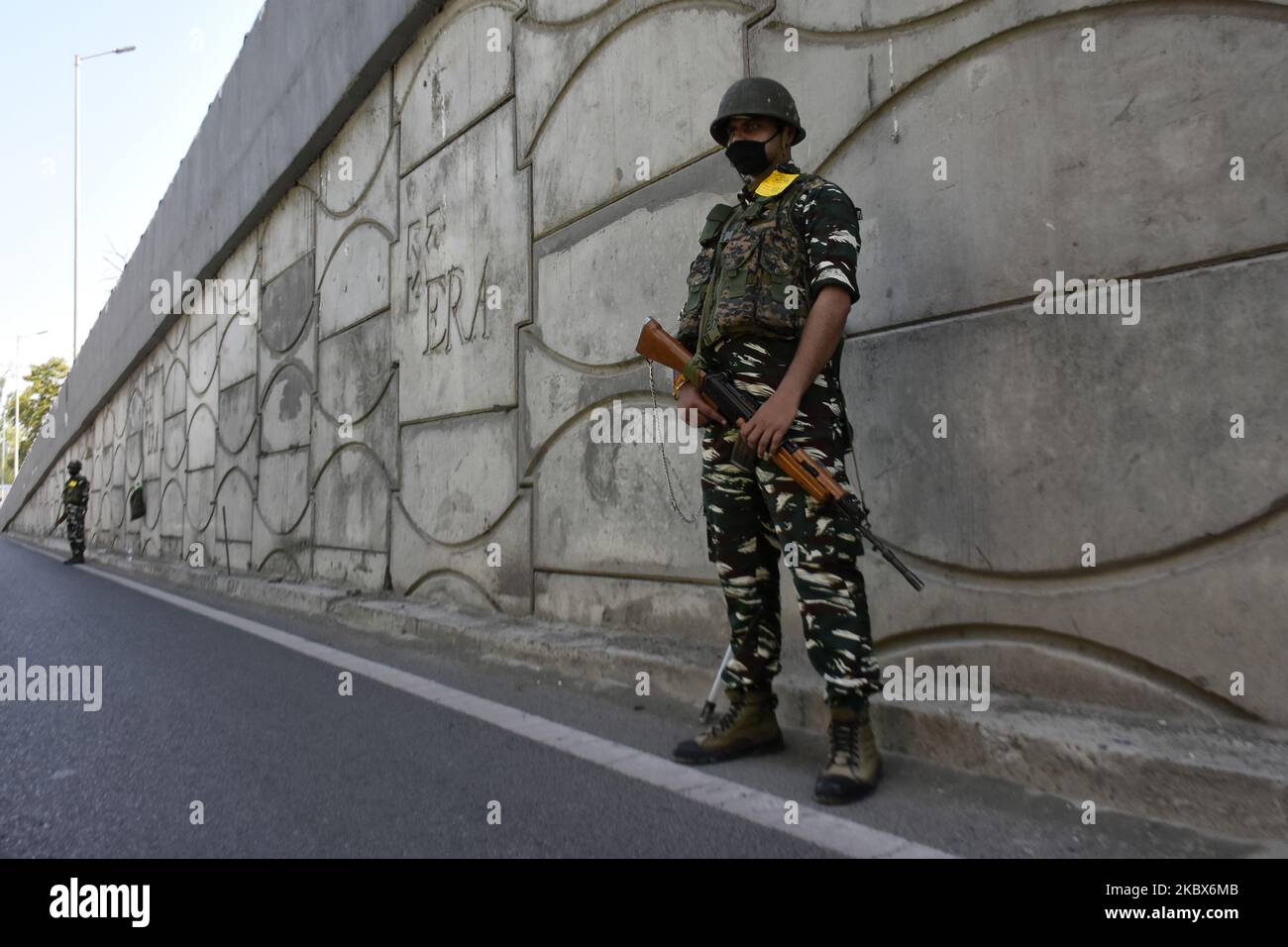 Indian paramillitary forces remain alert during curfew as India ...