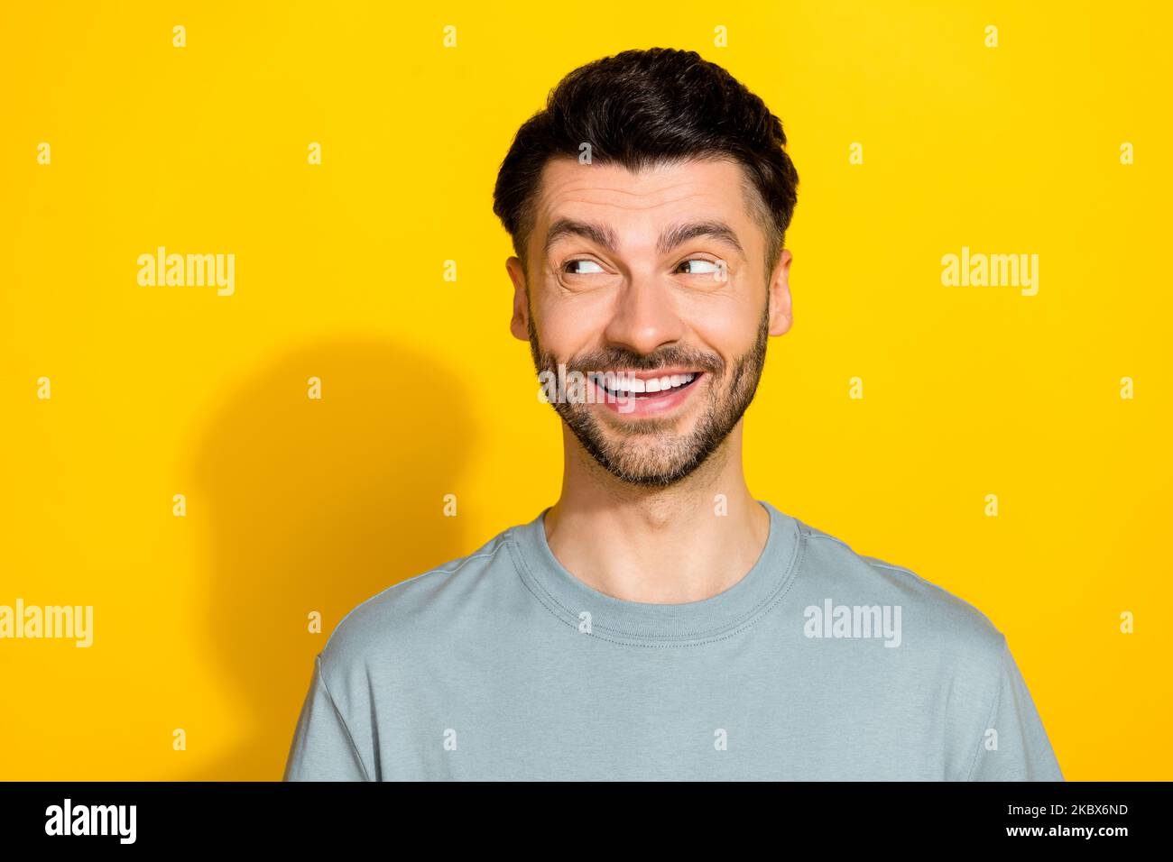 Closeup photo of young excited man bearded excited look empty space ...