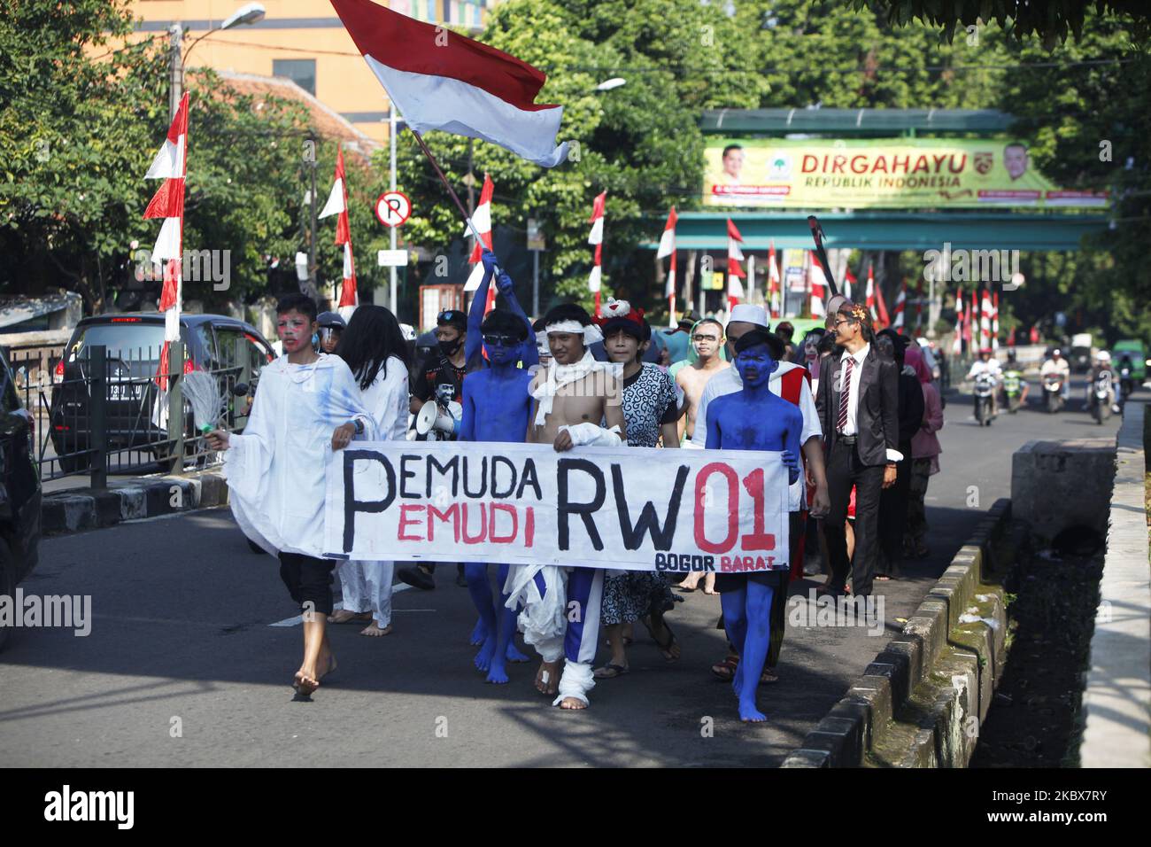 The Indonesian youth perform the parade with unique makeup during ...