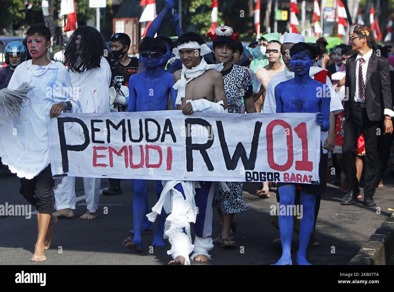 The Indonesian youth perform the parade with unique makeup during ...