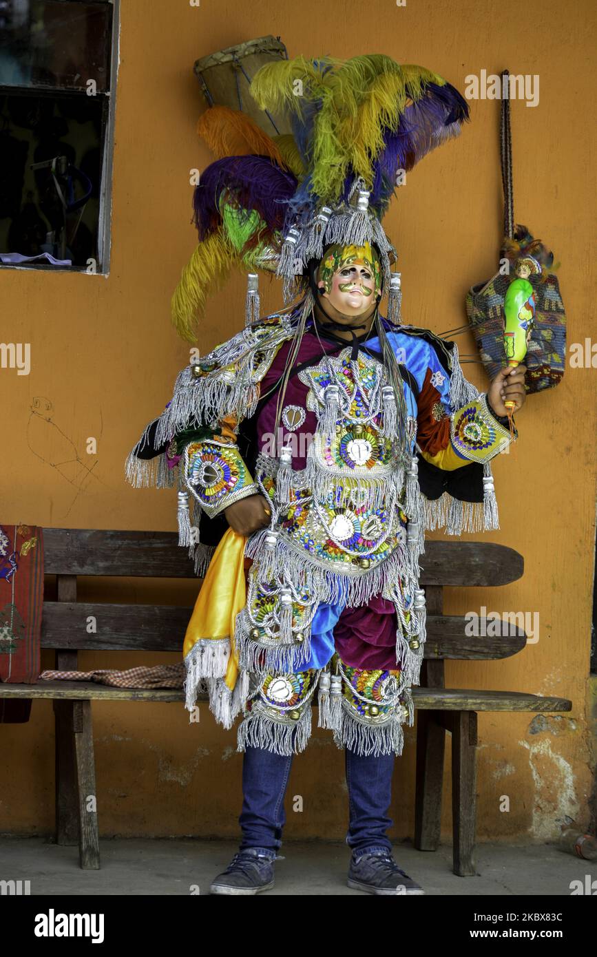 A man in a Moorish costume poses for the photo used for the procession ...