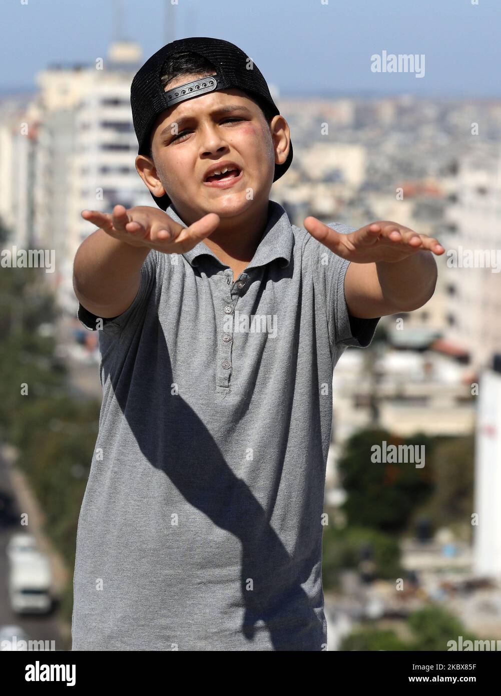 A Palestinian Rappers Abdul Rahman Al-Shanti,11, performing on a ...