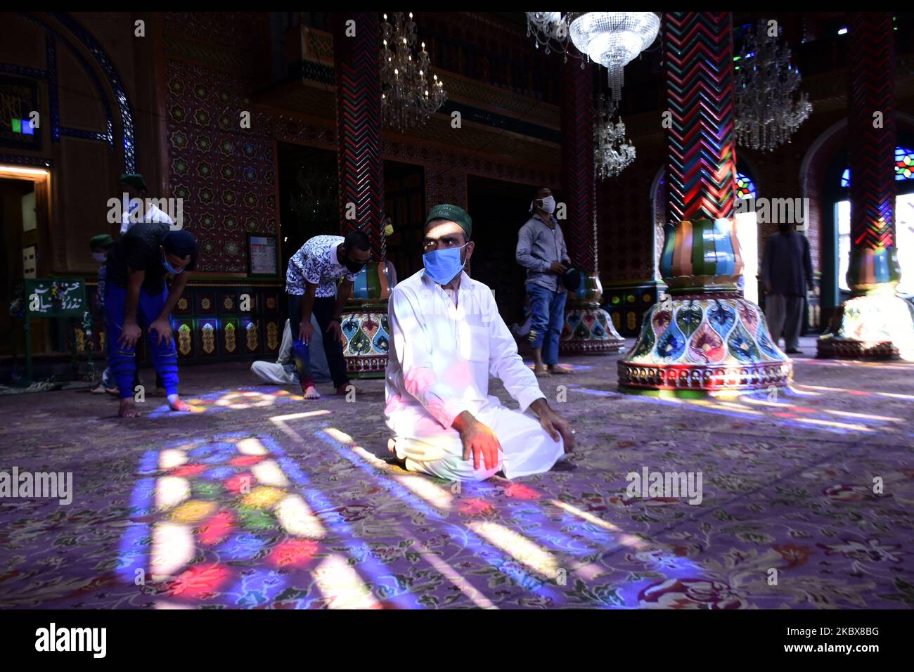 A Kashmiri muslim man offer prayers while maintaining social distance ...