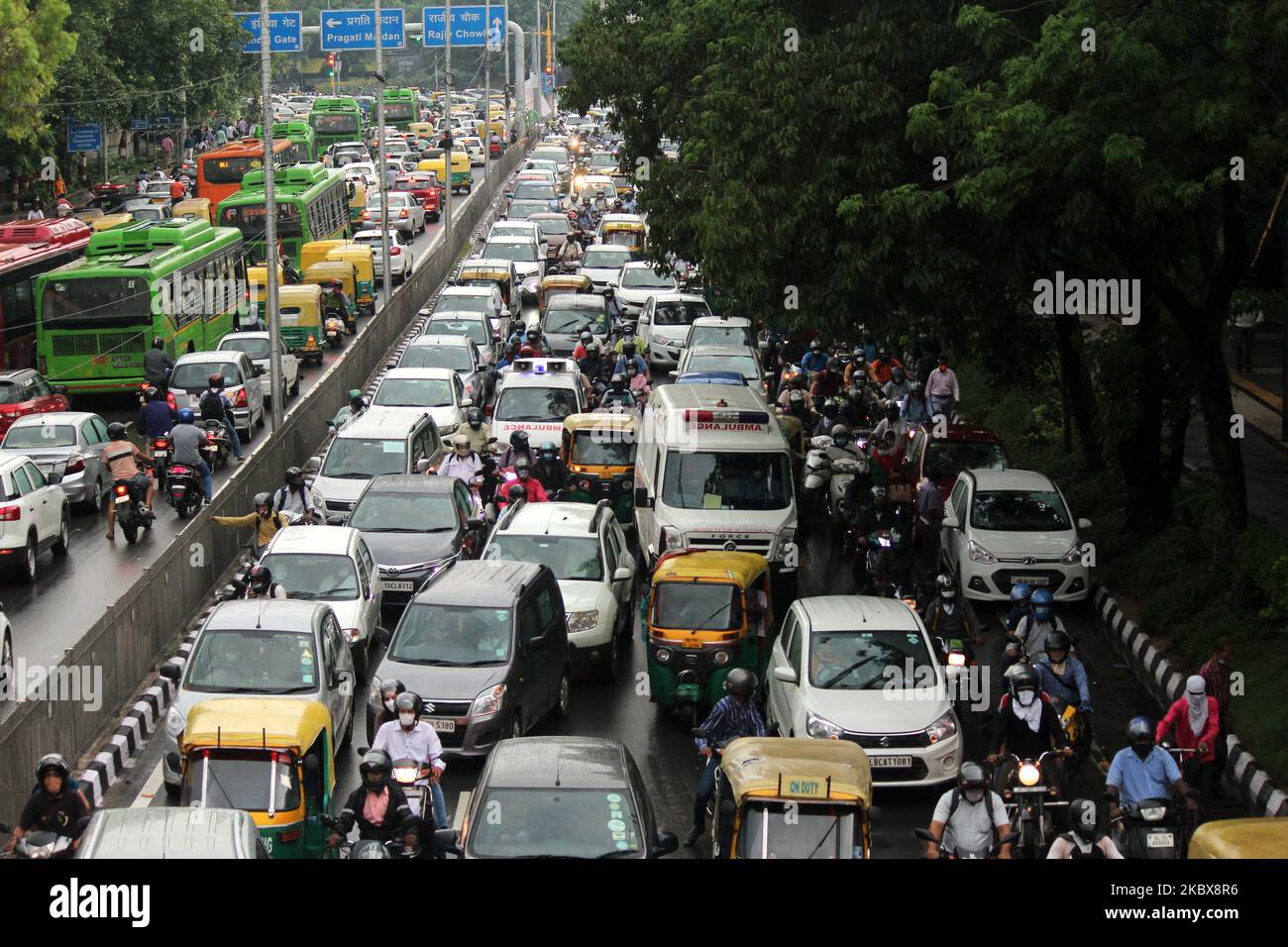 An ambulance stuck amid heavy traffic congestion caused after a heavy ...