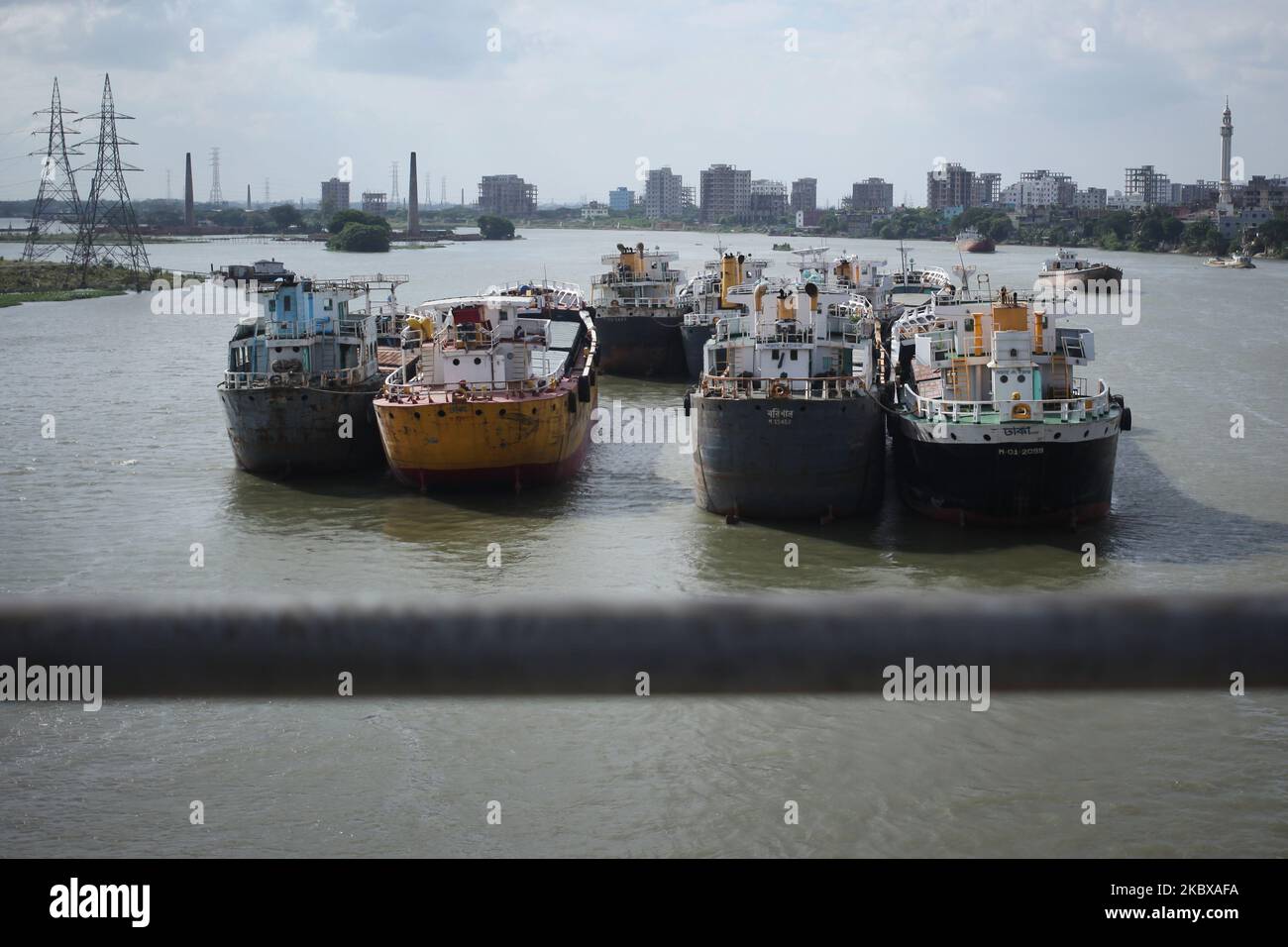 Ships are seen stuck in the middle of the river Buriganga as water ...