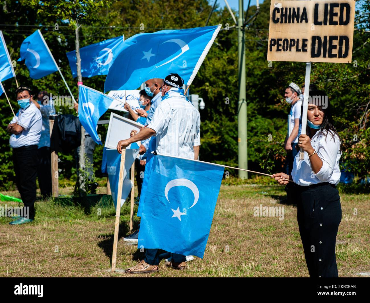 A woman is holding a placard against China, during the demonstration ...