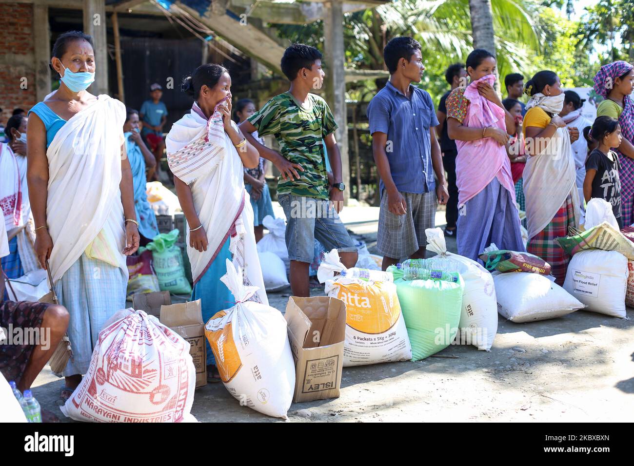 Flood relief distribution by the Feeding India team at Disangmukh ...