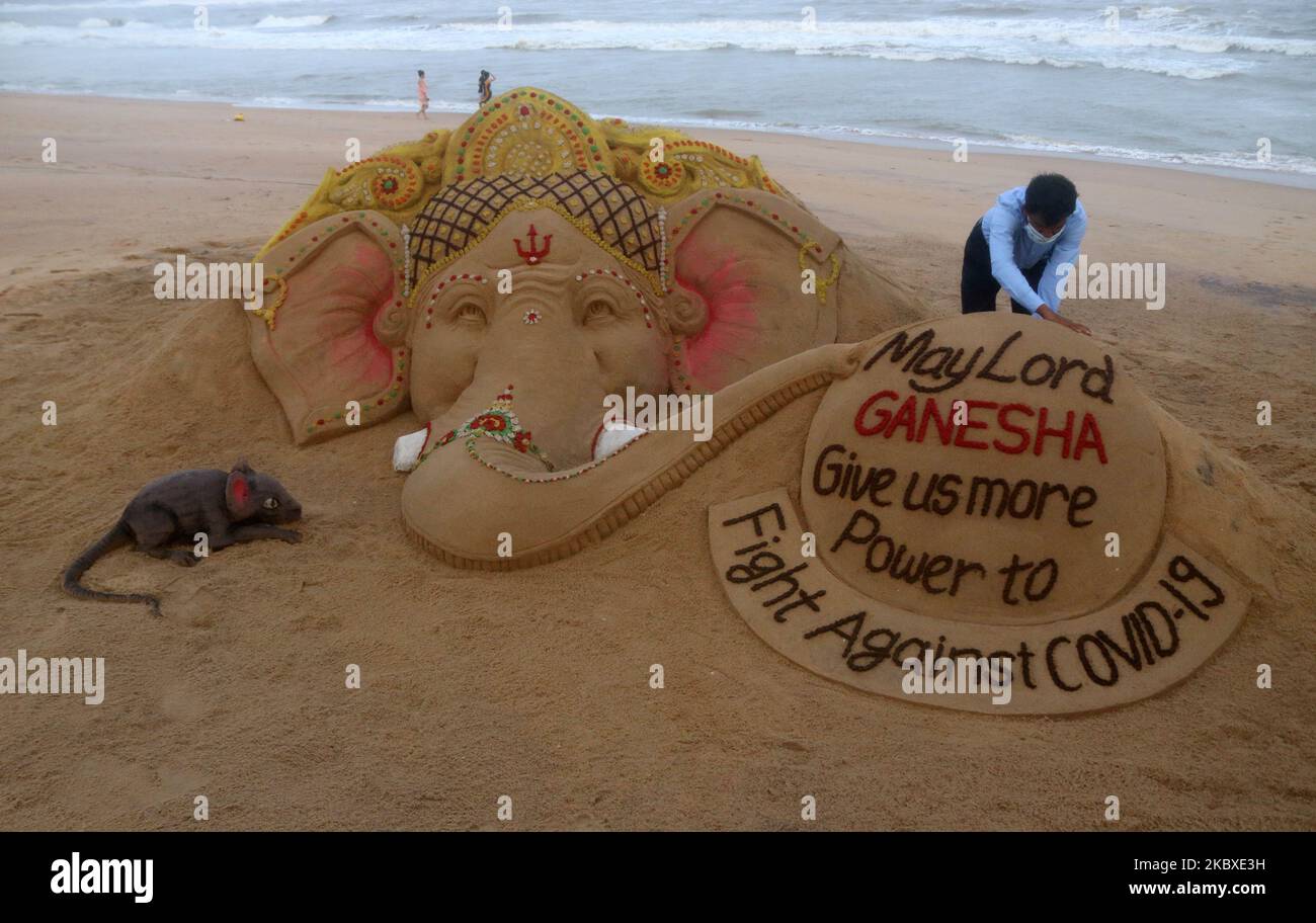 Indian sand artist Sudarshan Patnaik gives finishing touches to his ...