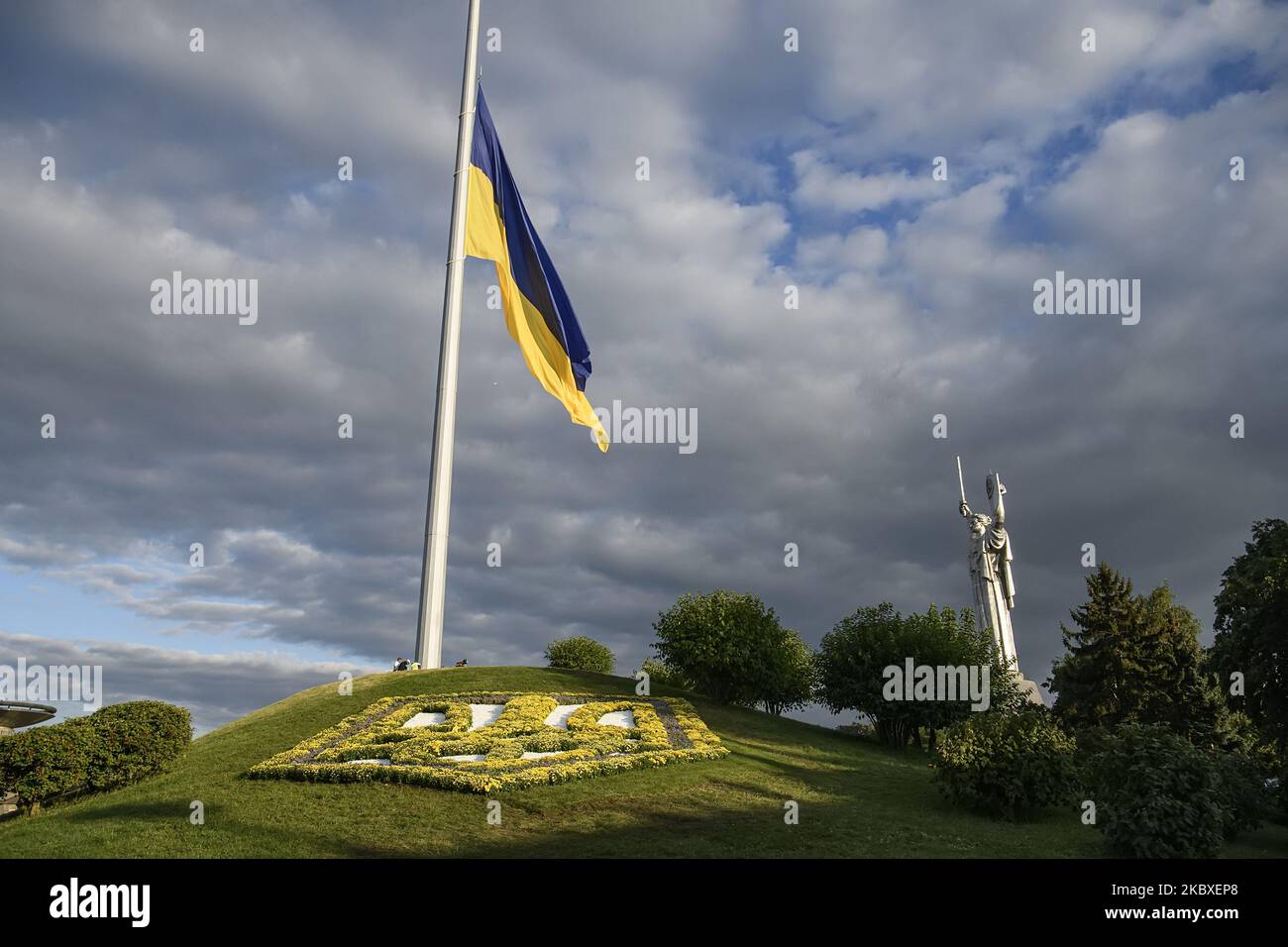 Ukrainians set up the giant state flag of Ukraine the night before the ...